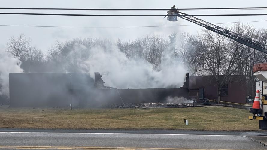 Utility pole collapse triggers gas-fueled fire at Bucks County business ...