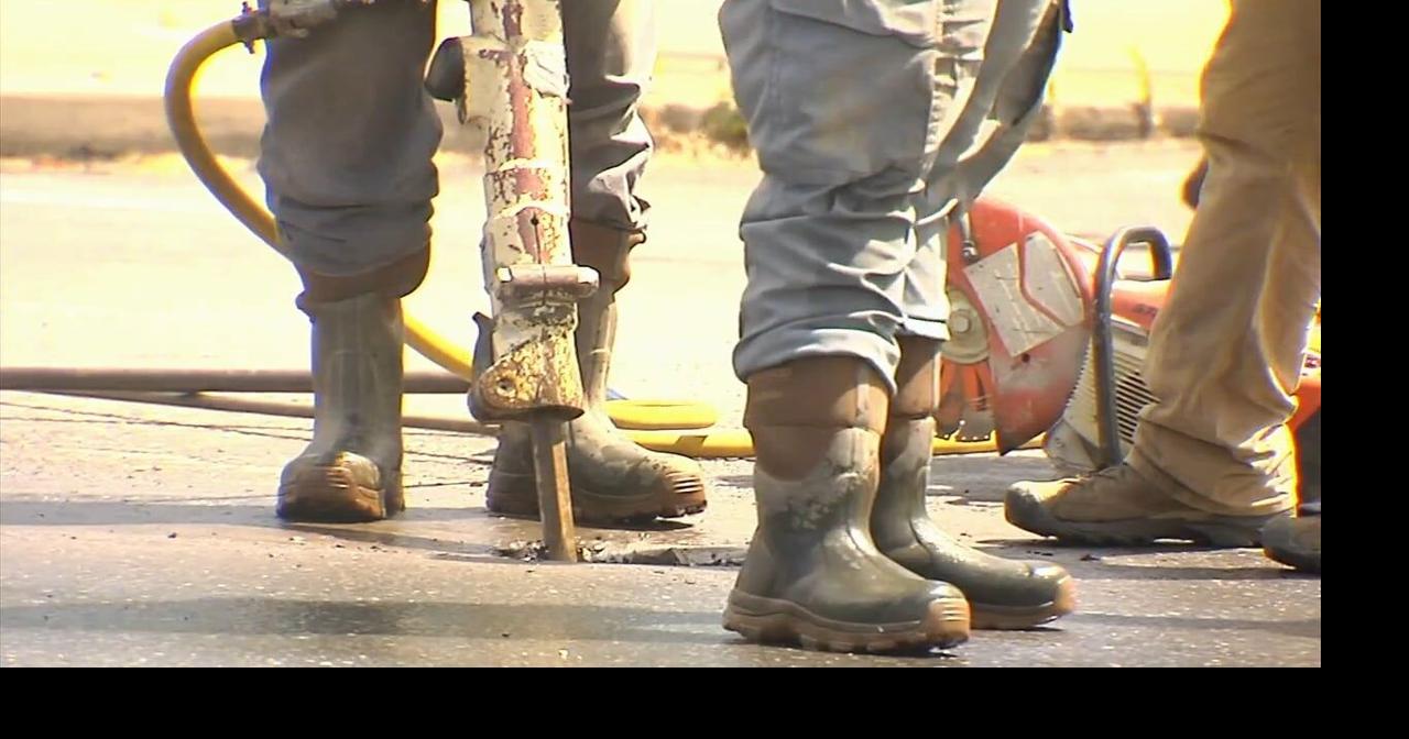 Crews work for hours to repair water main break at busy intersection ...