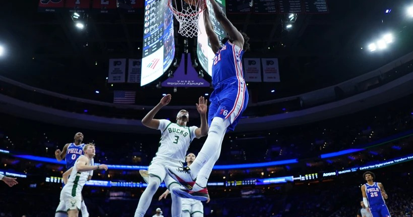 George scores 32 and Embiid has 29 to lead 76ers past short-handed ...