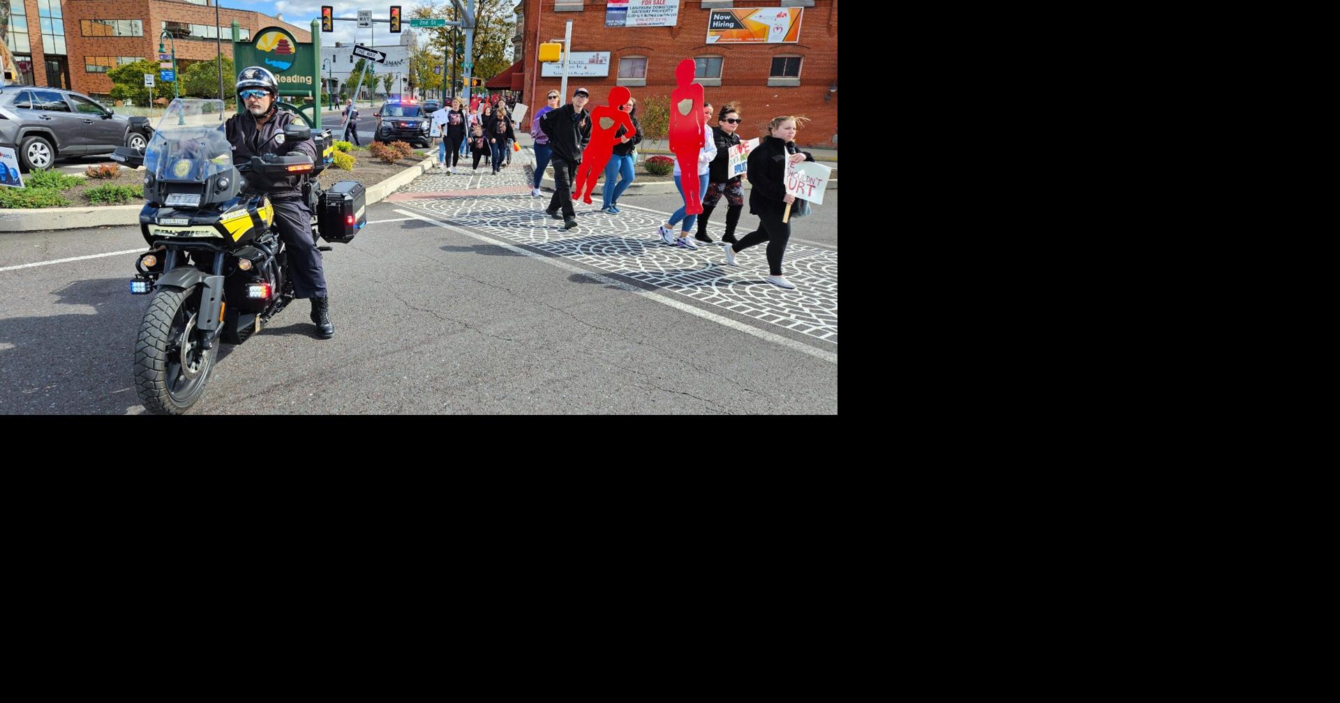 Red silhouettes honor victims of domestic abuse in 'Silent Witness ...