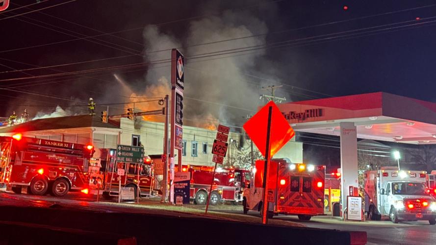 Crews battle fire at former furniture store building in Berks County ...