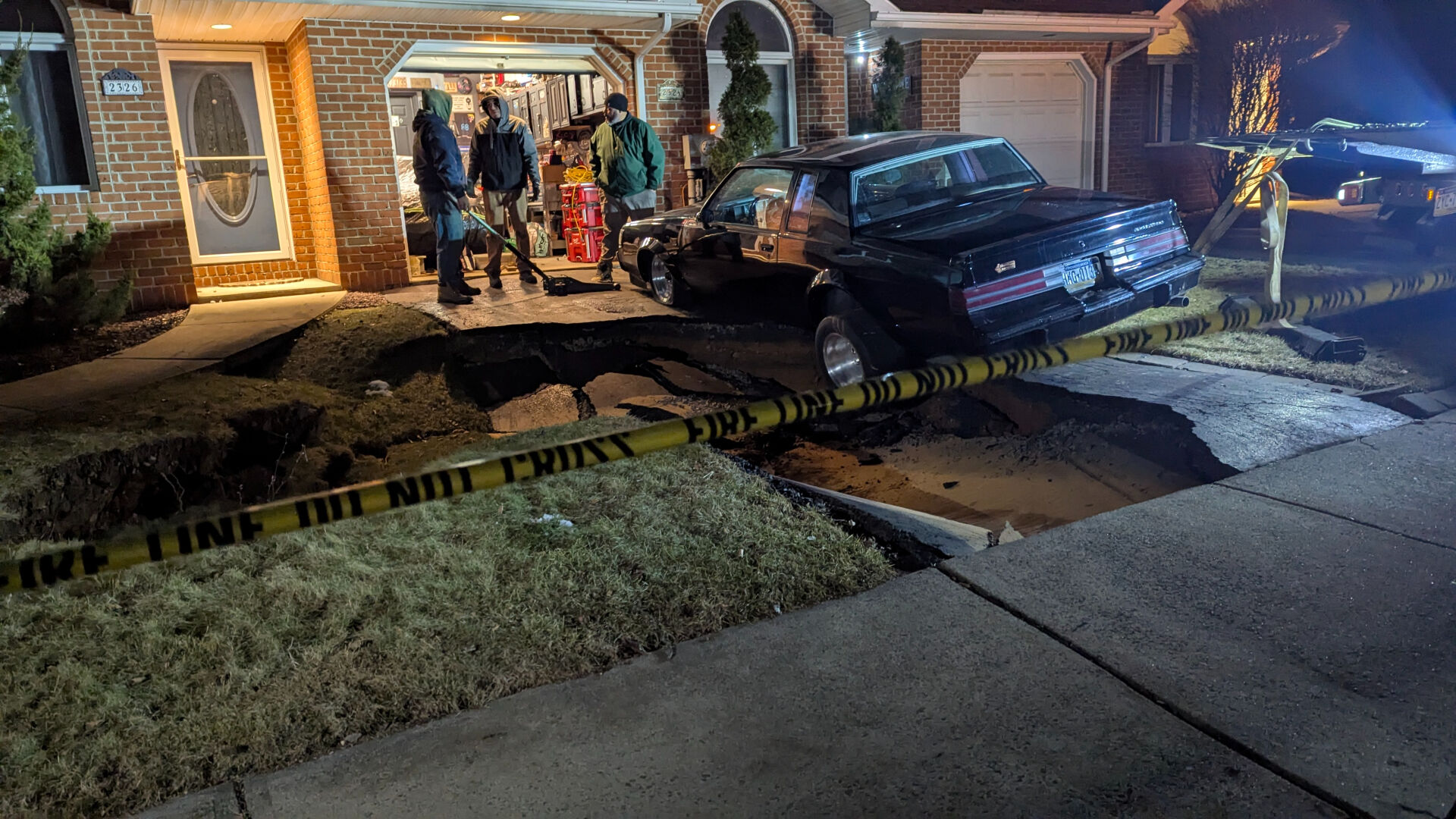 Sinkhole opens up in front of home in Bethlehem, part of car hangs over ...
