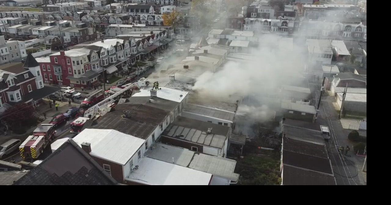 More than a dozen displaced after flames, smoke tear through rowhomes ...