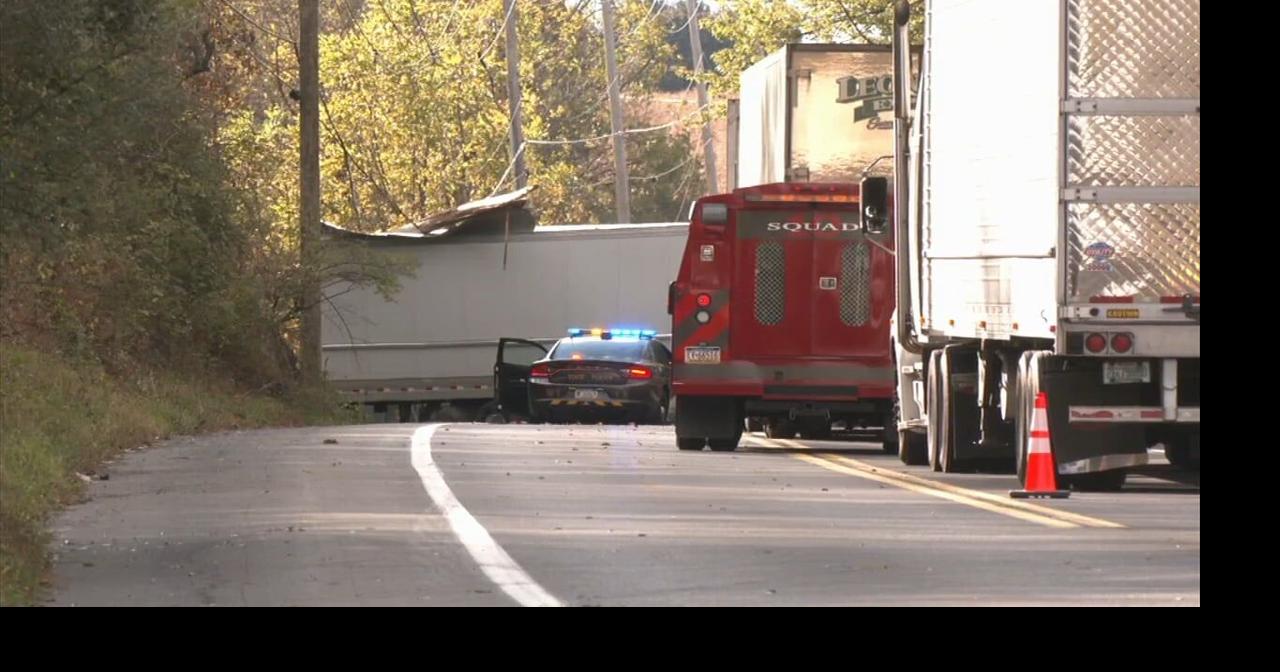 Truck jack-knifes, blocks lanes after taking down utility pole, closes ...