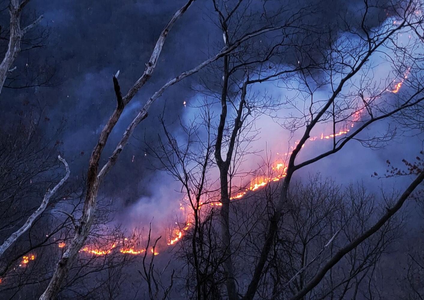 'Spread up the mountain': Multiple fire departments called in to battle ...