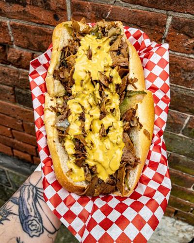 Eight months after fire, Paranormal Pizza still serving customers via ...