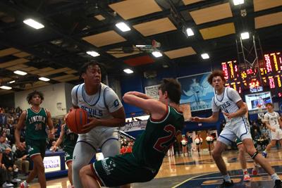 QHS on cusp of tournament glory with undefeated Collinsville standing ...