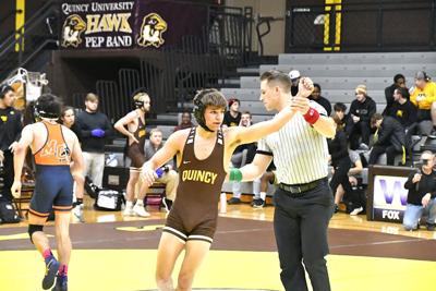QU wrestling wins inaugural duel | Sports | whig.com