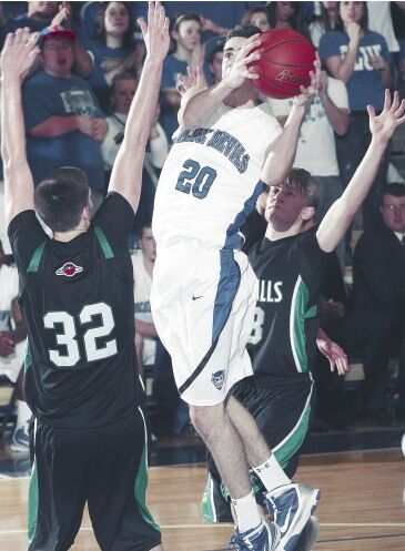 Quincy basketball finishes off undefeated season | Article | whig.com