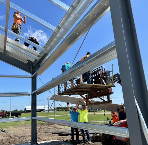 Volunteers help “raise” heritage farm pavilion | Agriculture | whig.com