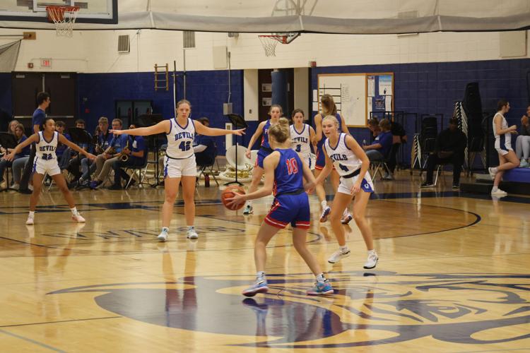 QHS rolls towards comfortable win in home opener over Cardinals ...