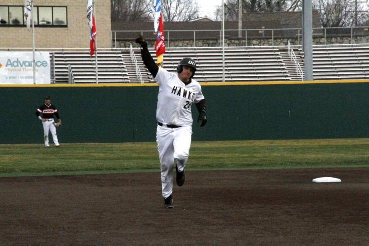 Kirn's arm, Simpson's power lead Hawks to victory in home opener ...