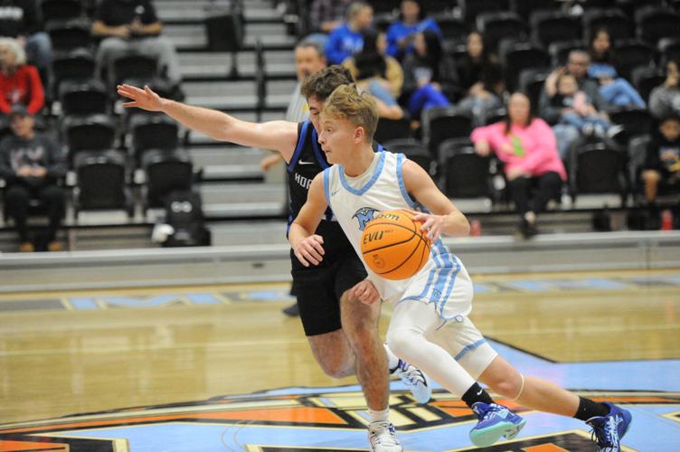 Miners top Phelps 68-62 in season opener | Sports | williamsondailynews.com