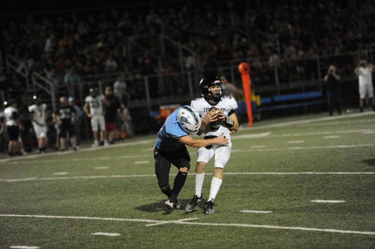 Prep football: Panthers dig deep, pick up first win over rival Miners ...