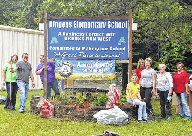 Lowes builds handicapped swing at Dingess Elementary | News ...
