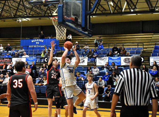 Phelps flexes muscles with a 72-49 win over Hurley | Sports ...