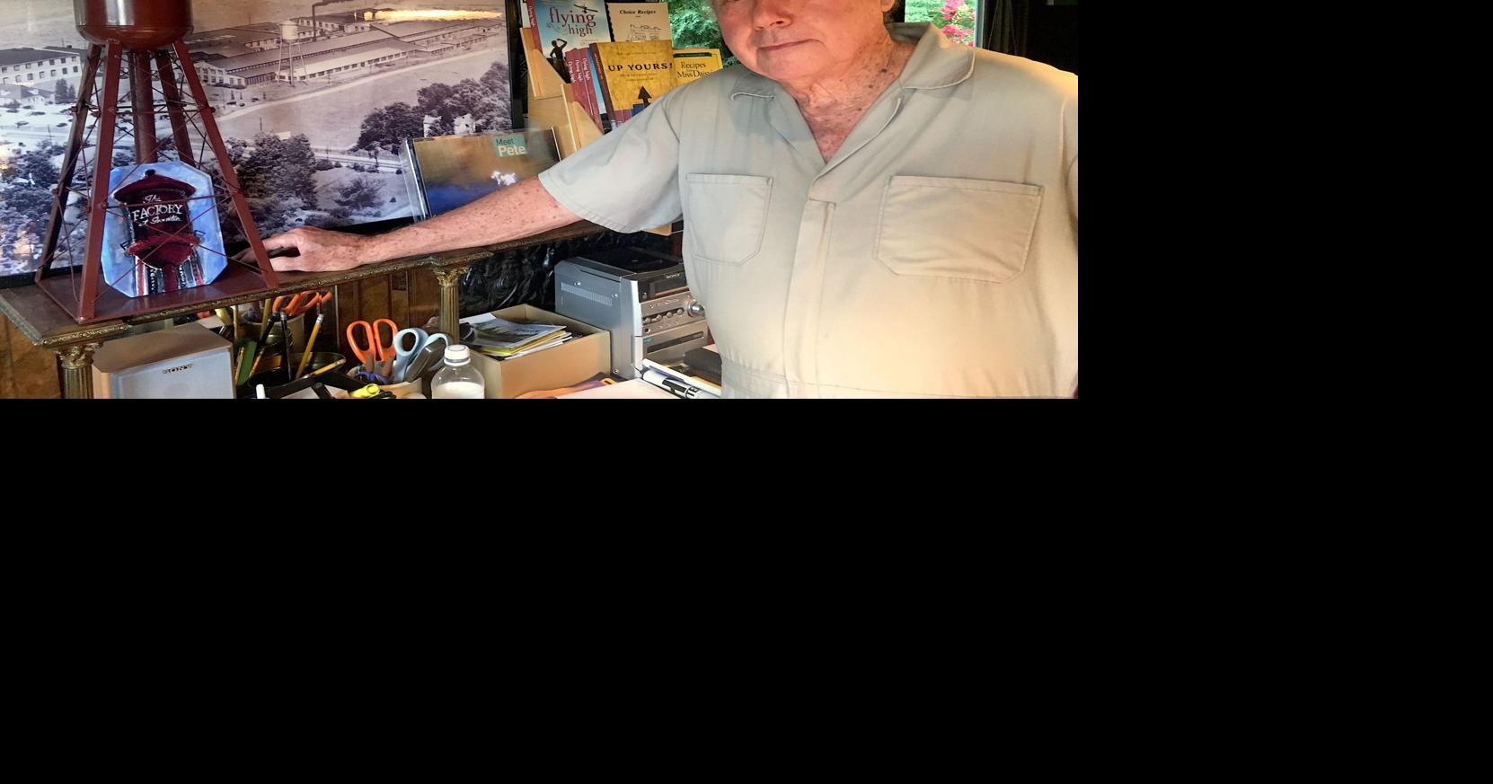 Franklin entrepreneur Calvin Lehew shows his rare commissioned replica of the water tower, a ...