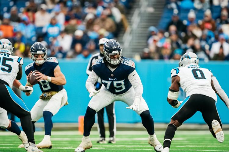Henry runs for 2 TDs as the Titans hold off Panthers | Sports ...
