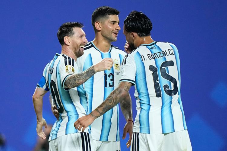 Messi has his first World Cup hat trick as defending champion Argentina ...