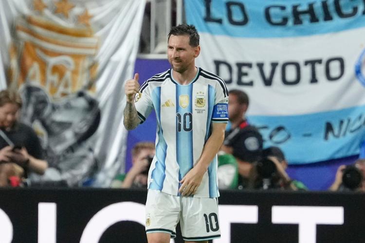 Messi has his first World Cup hat trick as defending champion Argentina ...