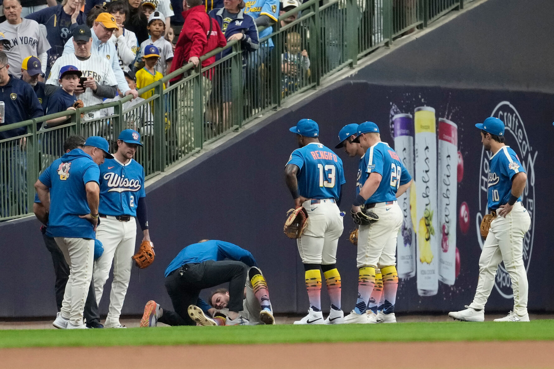 Brewers outfielder Brandon Lockridge carted off field after crashing ...