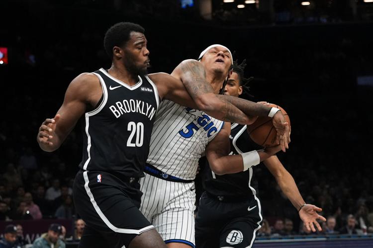 Banchero banks in 3-pointer at OT buzzer to lift Magic past Nets, 104 ...
