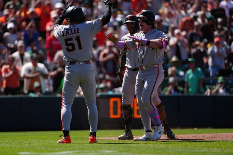 Bader's wind-aided grand slam helps Giants breeze to 10-1 victory over ...