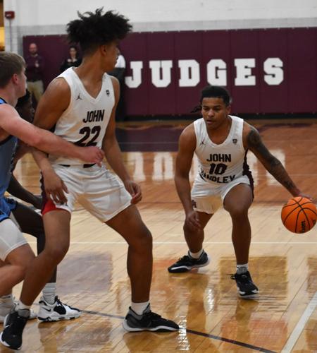 Handley boys take semifinal, edge Millbrook by two points for third ...