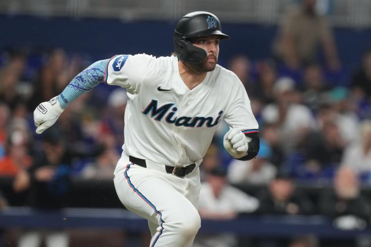 Marlins beat the Orioles 4-3 on a 9th-inning throwing error to avoid ...