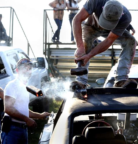 Precision collision: Drivers wow during demolition derby at Frederick ...