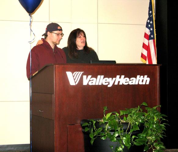 Son who used CPR to save mother's life receives award from WMC ...