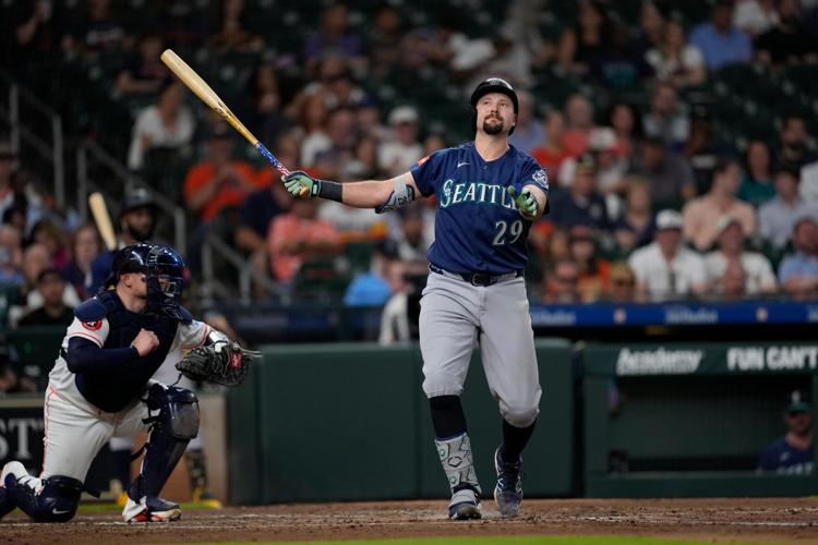 Mariners star catcher Cal Raleigh had hunch right oblique injury would ...
