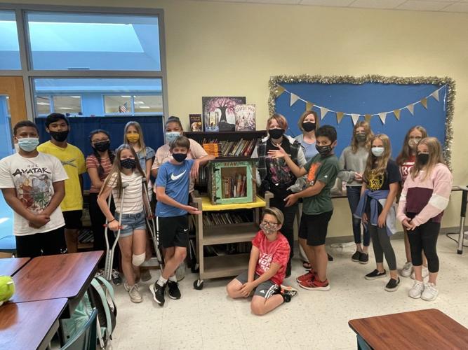 DMIS sixth graders create little libraries to address community ...