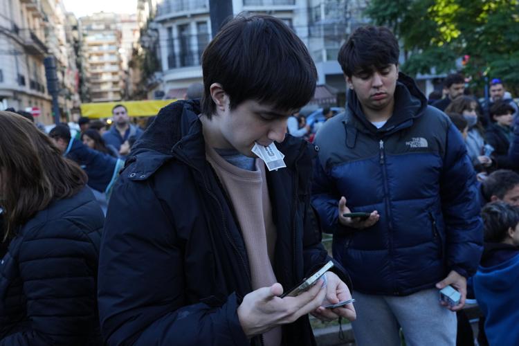 Argentine plazas buzz with World Cup sticker trading fever | Associated ...