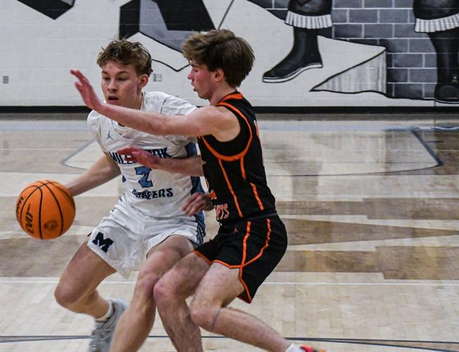 Millbrook boys hold on late to defeat Charlottesville, advance in ...