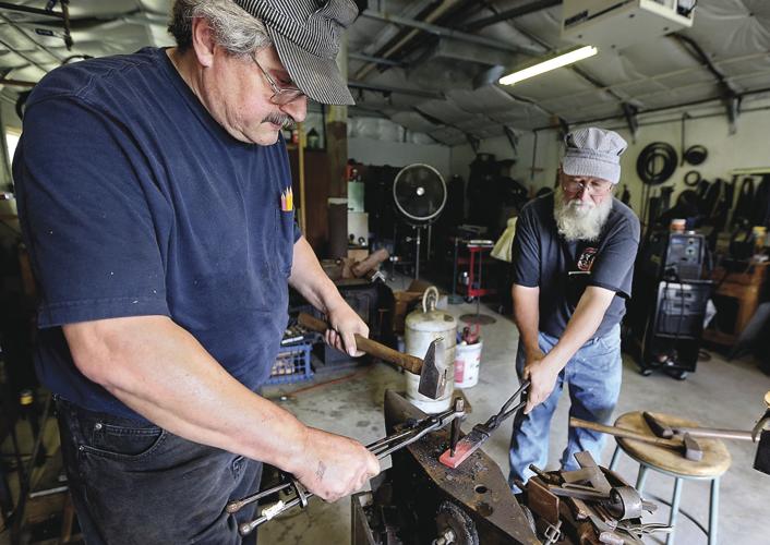 Local blacksmiths forge ahead with old-time craft | Features ...