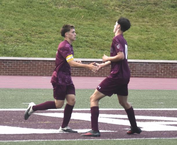 Carter breaks single-season goal record as Handley routs Wood ...