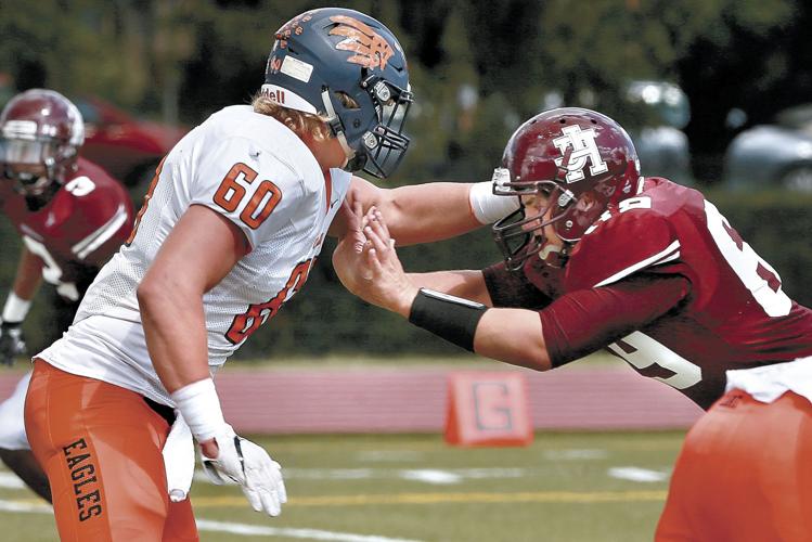 Handley's Teahan signs to play football at Howard | High School ...