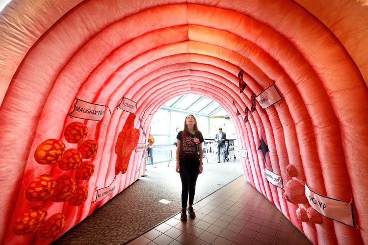 'Do your duty to your booty': Giant inflatable colon draws attention to ...