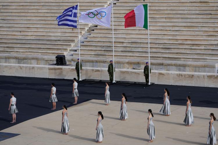 Olympic flame for Milan Cortina Winter Games handed to Italian ...