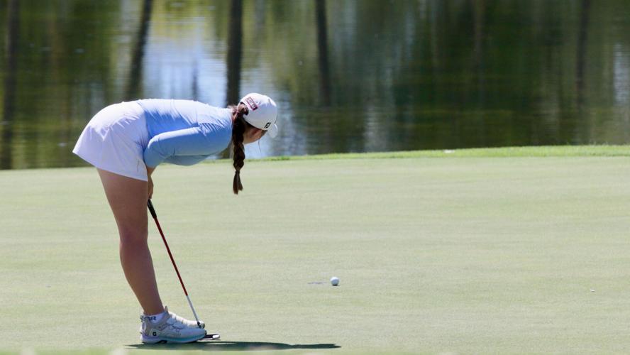 Photos: Wisconsin's Bobbi Stricker, Emily Lauterbach, Taitum Beck tee ...