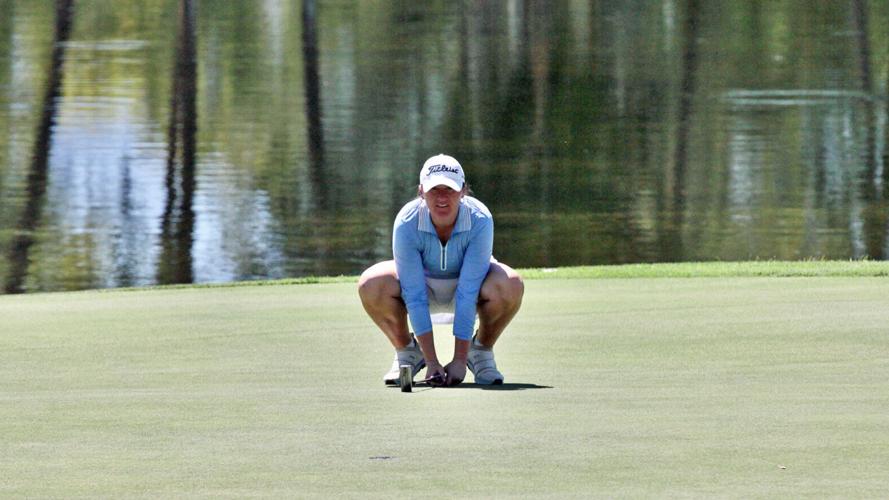 Photos: Wisconsin's Bobbi Stricker, Emily Lauterbach, Taitum Beck tee ...