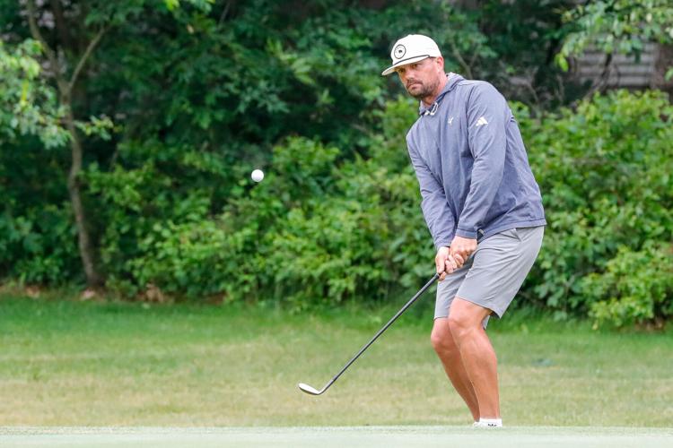 'My hands were a little shaky': Adam Garski sinks birdie putt on 21st ...