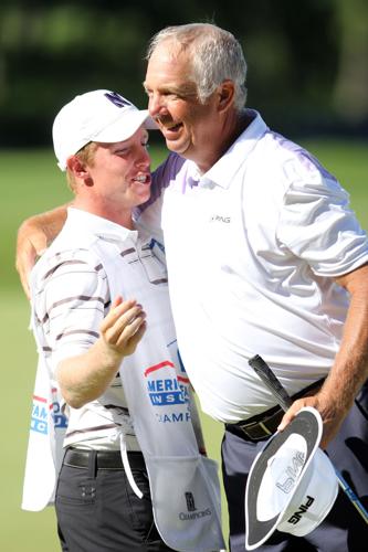 Spending the weekend caddying for his Am Fam champion father was an ...