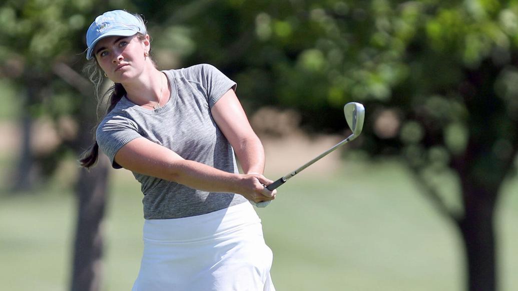 With her back to the recruiting wall, Notre Dame Academy's Grace Durkin ...