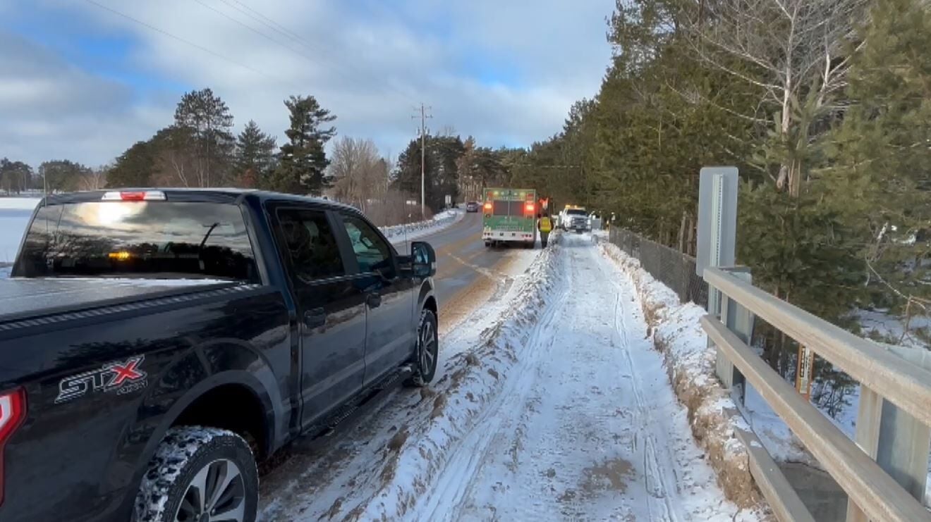 Snowmobiler goes through ice on Boom Lake near Eagle Street bridge in ...
