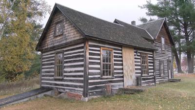 Travelers from Denmark visit historic log cabin in Mole Lake | Local ...