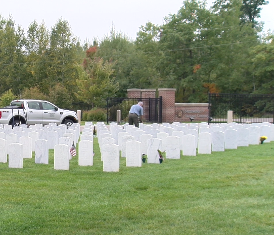 Volunteers clean gravestones, spruce up Northwoods National Cemetery to ...