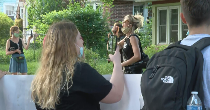 Protesters march to Mayor Rhodes-Conway’s house, demand police cuts ...