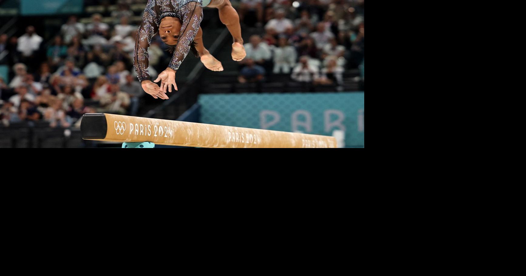 Simone Biles fights through calf injury to produce impressive ...